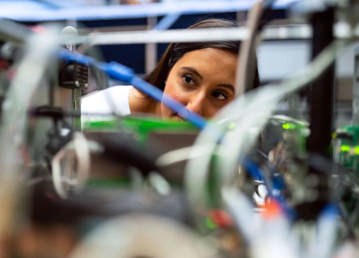 What is a plotter, and how does it differ from a traditional printer?